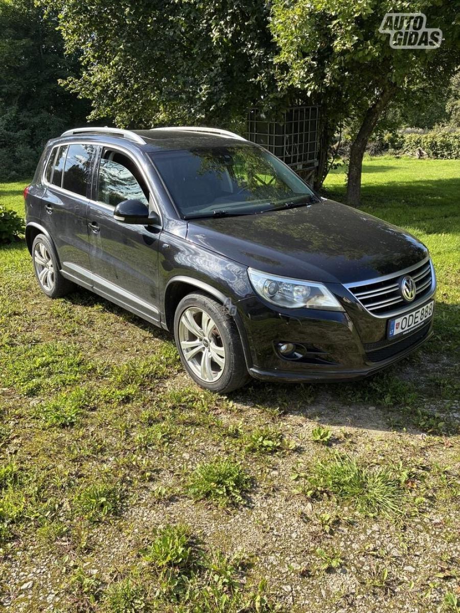 Melns Volkswagen Tiguan 2009 Radviliškis, ar dzinēja tilpumu 2.00 L un nobraukumu 198 tūkst. km par 6400 €, foto 1 vietnē AUTOMOTO.COM.LV