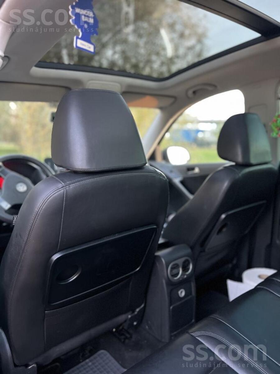 Black Volkswagen Tiguan 2009 in Riga, with an engine capacity of 2.00 L and mileage of 289 thousand km for 4300 €, photo 23 on AUTOMOTO.COM.LV