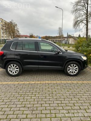 Black Volkswagen Tiguan 2010 in Liepaja, with an engine capacity of 2.00 L and mileage of 216 thousand km for 7500 €, photo  on AUTOMOTO.COM.LV