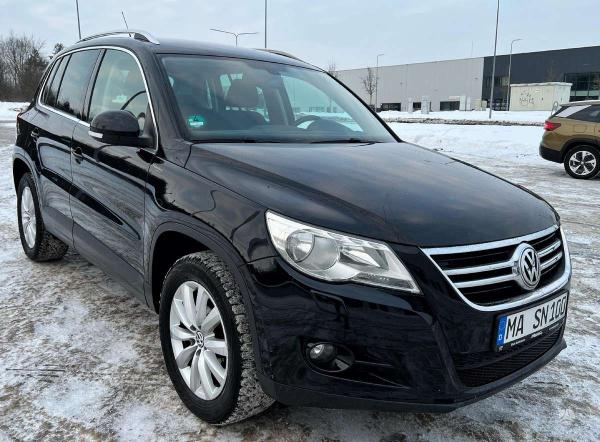 Black Volkswagen Tiguan 2010 in Vilnius, with an engine capacity of 1.40 L and mileage of 233 thousand km for 5500 €, photo 1 on AUTOMOTO.COM.LV