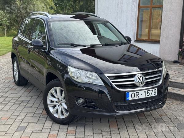 Black Volkswagen Tiguan 2010 in Jelgava, with an engine capacity of 2.00 L and mileage of 252 thousand km for 6700 €, photo 1 on AUTOMOTO.COM.LV
