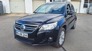 Black Volkswagen Tiguan 2010 in Marijampole, with an engine capacity of 2.00 L and mileage of 235 thousand km for 6200 €, photo  on AUTOMOTO.COM.LV