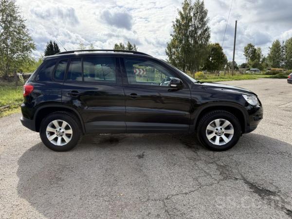 Black Volkswagen Tiguan 2010 in Ogre, with an engine capacity of 2.00 L and mileage of 133 thousand km for 7499 €, photo 8 on AUTOMOTO.COM.LV