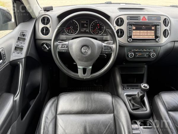 Black Volkswagen Tiguan 2010 in Ogre, with an engine capacity of 2.00 L and mileage of 133 thousand km for 7499 €, photo 11 on AUTOMOTO.COM.LV