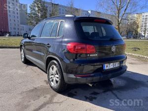 Black Volkswagen Tiguan 2011 in Jelgava, with an engine capacity of 1.40 L and mileage of 188 thousand km for 6600 €, photo 3 on AUTOMOTO.COM.LV