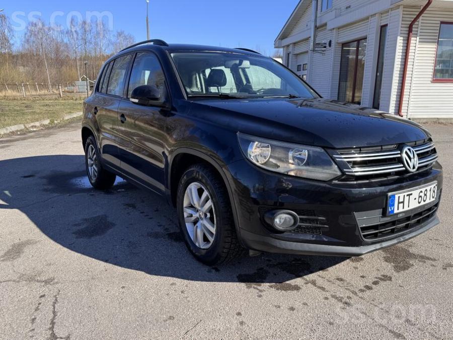 Black Volkswagen Tiguan 2011 in Jelgava, with an engine capacity of 1.40 L and mileage of 188 thousand km for 6600 €, photo 5 on AUTOMOTO.COM.LV