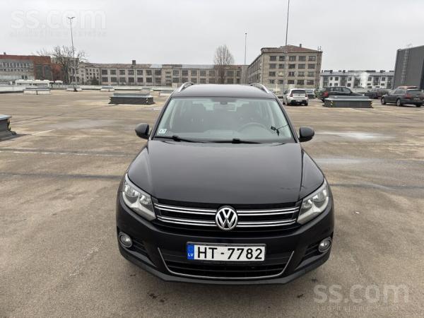 Black Volkswagen Tiguan 2011 in Riga, with an engine capacity of 2.00 L and mileage of 220 thousand km for 7000 €, photo 2 on AUTOMOTO.COM.LV