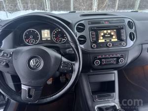 Black Volkswagen Tiguan 2011 in Daugavpils, with an engine capacity of 2.00 L and mileage of 213 thousand km for 9590 €, photo 13 on AUTOMOTO.COM.LV
