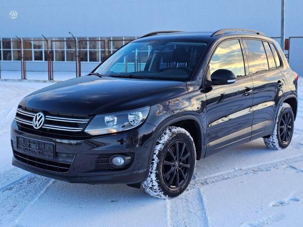 Black Volkswagen Tiguan 2011 in Rokiskis, with an engine capacity of 1.97 L and mileage of 286 thousand km for 6550 €, photo 1 on AUTOMOTO.COM.LV