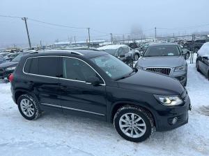 Black Volkswagen Tiguan 2011 in Kaunas, with an engine capacity of 1.97 L and mileage of 216 thousand km for 8850 €, photo 4 on AUTOMOTO.COM.LV