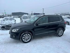 Black Volkswagen Tiguan 2011 in Kaunas, with an engine capacity of 1.97 L and mileage of 216 thousand km for 8850 €, photo 9 on AUTOMOTO.COM.LV