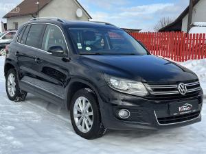 Black Volkswagen Tiguan 2011 in Pabrade, with an engine capacity of 2.00 L and mileage of 219 thousand km for 8799 €, photo 2 on AUTOMOTO.COM.LV