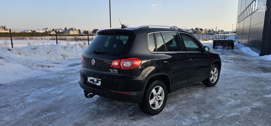 Black Volkswagen Tiguan 2011 in Kaunas, with an engine capacity of 2.00 L and mileage of 310 thousand km for 6850 €, photo 9 on AUTOMOTO.COM.LV