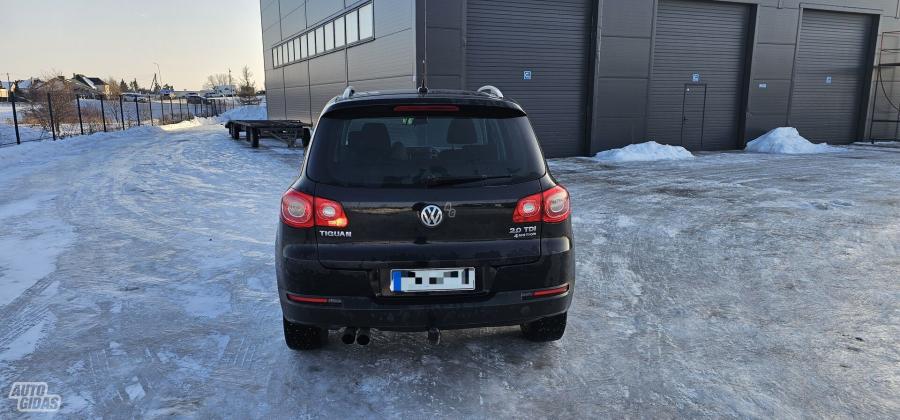 Black Volkswagen Tiguan 2011 in Kaunas, with an engine capacity of 2.00 L and mileage of 310 thousand km for 6850 €, photo 10 on AUTOMOTO.COM.LV