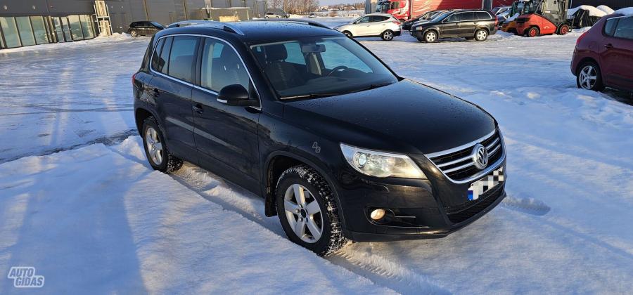 Black Volkswagen Tiguan 2011 in Kaunas, with an engine capacity of 2.00 L and mileage of 310 thousand km for 6850 €, photo 17 on AUTOMOTO.COM.LV