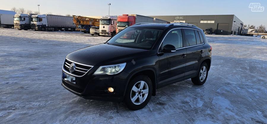 Black Volkswagen Tiguan 2011 in Kaunas, with an engine capacity of 2.00 L and mileage of 310 thousand km for 6850 €, photo 18 on AUTOMOTO.COM.LV