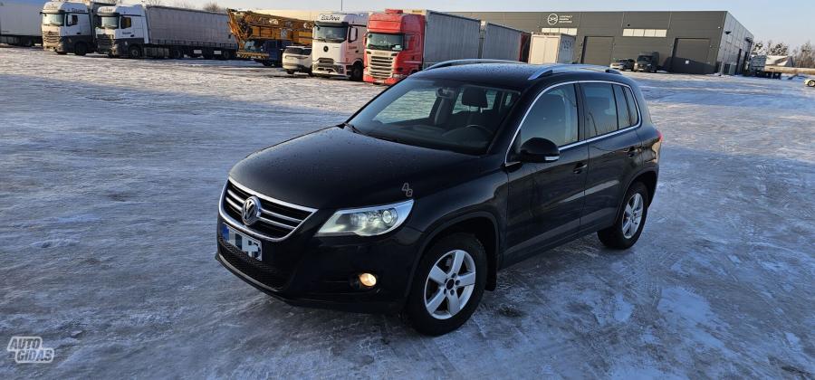 Black Volkswagen Tiguan 2011 in Kaunas, with an engine capacity of 2.00 L and mileage of 310 thousand km for 6850 €, photo 19 on AUTOMOTO.COM.LV