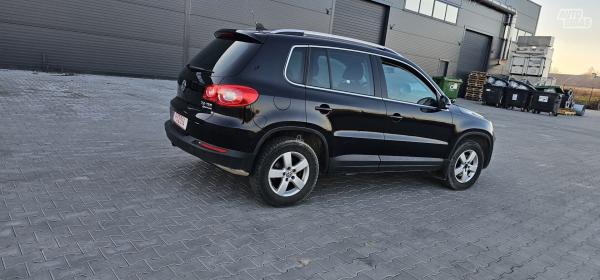 Black Volkswagen Tiguan 2011 in Kaunas, with an engine capacity of 2.00 L and mileage of 310 thousand km for 6650 €, photo 10 on AUTOMOTO.COM.LV