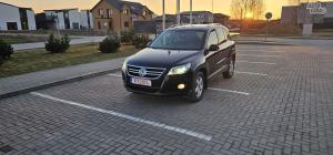 Black Volkswagen Tiguan 2011 in Kaunas, with an engine capacity of 2.00 L and mileage of 310 thousand km for 6650 €, photo 14 on AUTOMOTO.COM.LV