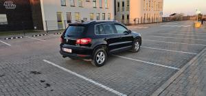 Black Volkswagen Tiguan 2011 in Kaunas, with an engine capacity of 2.00 L and mileage of 310 thousand km for 6650 €, photo 21 on AUTOMOTO.COM.LV