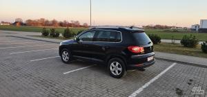 Black Volkswagen Tiguan 2011 in Kaunas, with an engine capacity of 2.00 L and mileage of 310 thousand km for 6650 €, photo 23 on AUTOMOTO.COM.LV