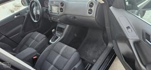 Black Volkswagen Tiguan 2011 in Kaunas, with an engine capacity of 2.00 L and mileage of 310 thousand km for 6650 €, photo 24 on AUTOMOTO.COM.LV