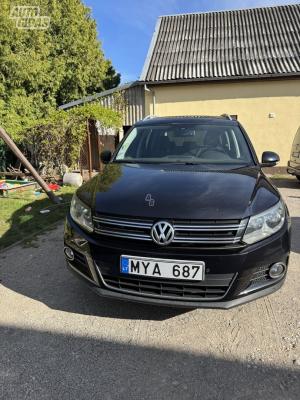 Black Volkswagen Tiguan 2011 in Kretinga, with an engine capacity of 2.00 L and mileage of 297 thousand km for 7000 €, photo  on AUTOMOTO.COM.LV