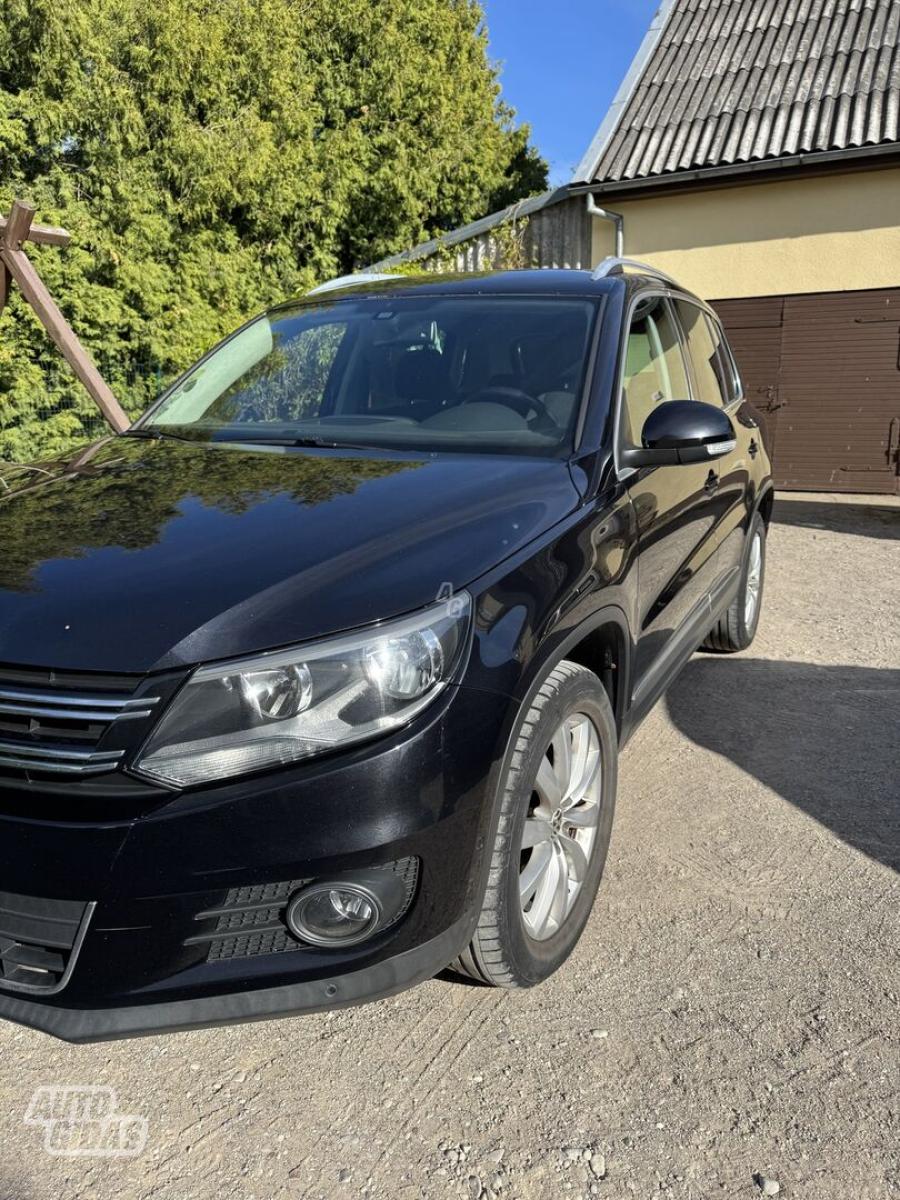 Black Volkswagen Tiguan 2011 in Kretinga, with an engine capacity of 2.00 L and mileage of 297 thousand km for 7000 €, photo 3 on AUTOMOTO.COM.LV