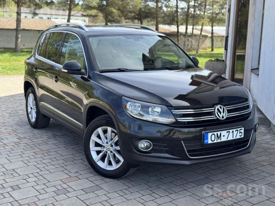 Melns Volkswagen Tiguan 2011 Jelgava, ar dzinēja tilpumu 2.00 L un nobraukumu 278 tūkst. km par 8900 €, foto 10 vietnē AUTOMOTO.COM.LV