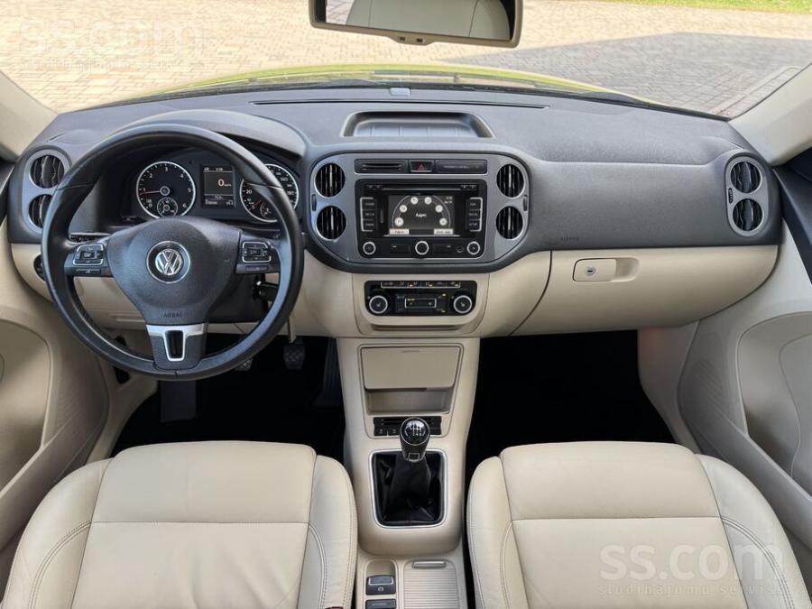 Melns Volkswagen Tiguan 2011 Jelgava, ar dzinēja tilpumu 2.00 L un nobraukumu 278 tūkst. km par 8900 €, foto 13 vietnē AUTOMOTO.COM.LV