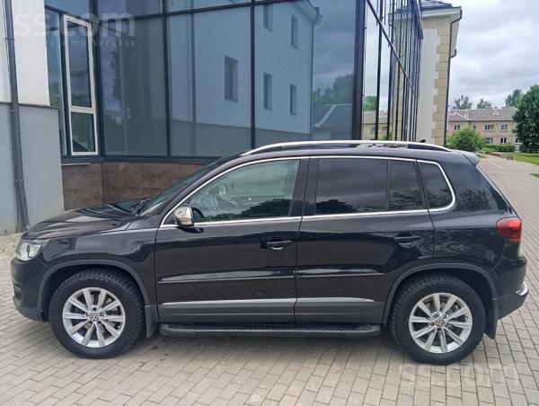 Black Volkswagen Tiguan 2011 in Balvi, with an engine capacity of 2.00 L and mileage of 281 thousand km for 8500 €, photo 6 on AUTOMOTO.COM.LV