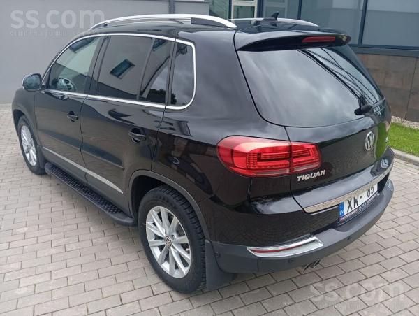 Black Volkswagen Tiguan 2011 in Balvi, with an engine capacity of 2.00 L and mileage of 281 thousand km for 8500 €, photo 7 on AUTOMOTO.COM.LV