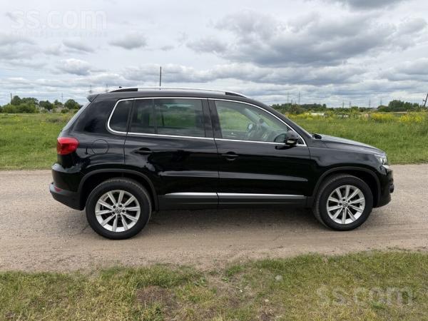 Melns Volkswagen Tiguan 2011 Daugavpils, ar dzinēja tilpumu 1.40 L un nobraukumu 252 tūkst. km par 8850 €, foto 5 vietnē AUTOMOTO.COM.LV