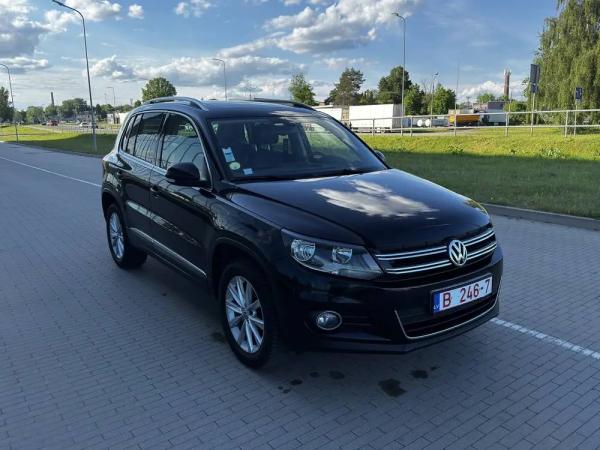 Black Volkswagen Tiguan 2011 in Rezekne, with an engine capacity of 2.00 L and mileage of 279 thousand km for 8900 €, photo 9 on AUTOMOTO.COM.LV