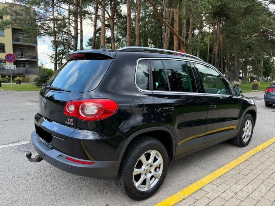 Black Volkswagen Tiguan 2011 in Riga, with an engine capacity of 1.40 L and mileage of 171 thousand km for 6350 €, photo 10 on AUTOMOTO.COM.LV