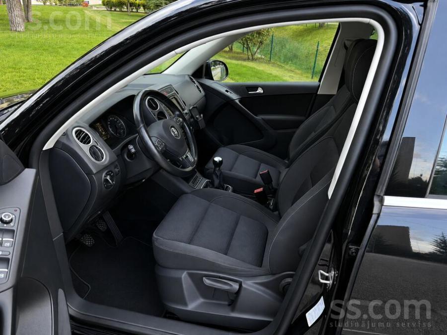 Black Volkswagen Tiguan 2011 in Riga, with an engine capacity of 1.40 L and mileage of 171 thousand km for 6350 €, photo 11 on AUTOMOTO.COM.LV