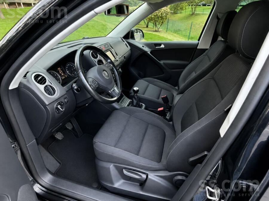 Black Volkswagen Tiguan 2011 in Riga, with an engine capacity of 1.40 L and mileage of 171 thousand km for 6350 €, photo 12 on AUTOMOTO.COM.LV