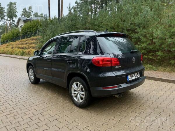 Black Volkswagen Tiguan 2011 in Riga, with an engine capacity of 2.00 L and mileage of 237 thousand km for 6500 €, photo 11 on AUTOMOTO.COM.LV