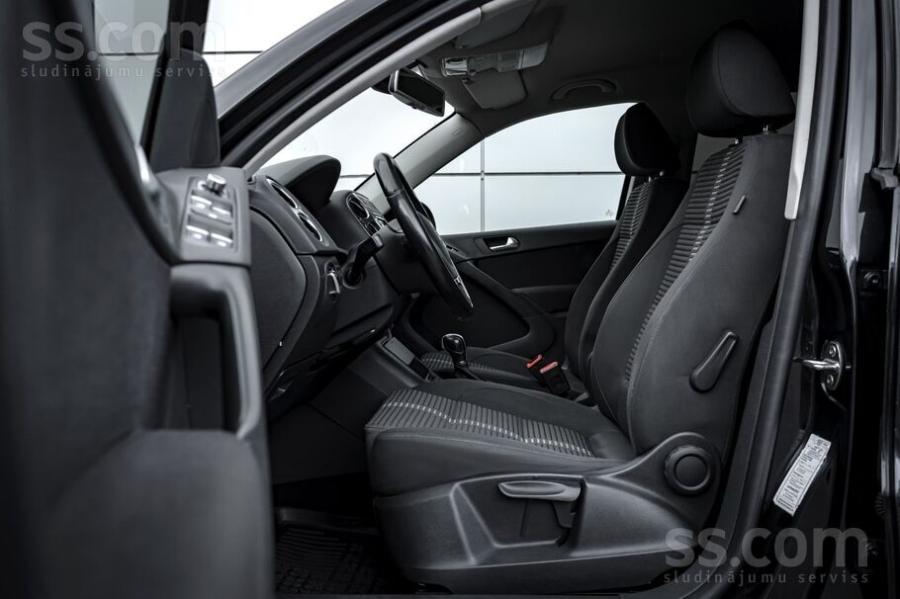 Black Volkswagen Tiguan 2011 in Riga, with an engine capacity of 2.00 L and mileage of 216 thousand km for 7490 €, photo 10 on AUTOMOTO.COM.LV