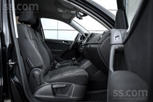 Black Volkswagen Tiguan 2011 in Riga, with an engine capacity of 2.00 L and mileage of 216 thousand km for 7490 €, photo 11 on AUTOMOTO.COM.LV