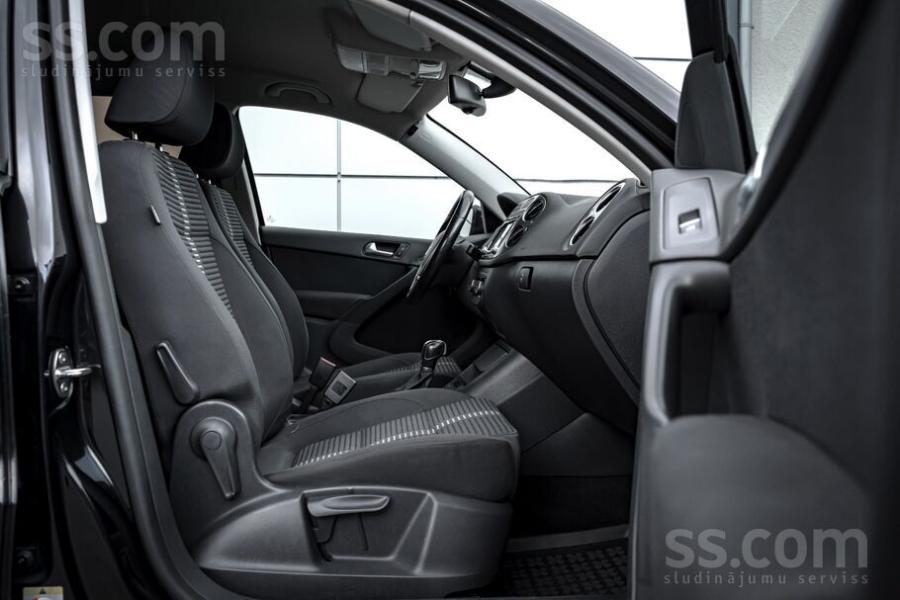 Black Volkswagen Tiguan 2011 in Riga, with an engine capacity of 2.00 L and mileage of 216 thousand km for 7490 €, photo 11 on AUTOMOTO.COM.LV