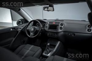 Black Volkswagen Tiguan 2011 in Riga, with an engine capacity of 2.00 L and mileage of 216 thousand km for 7490 €, photo 16 on AUTOMOTO.COM.LV