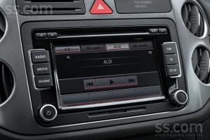 Black Volkswagen Tiguan 2011 in Riga, with an engine capacity of 2.00 L and mileage of 216 thousand km for 7490 €, photo 26 on AUTOMOTO.COM.LV