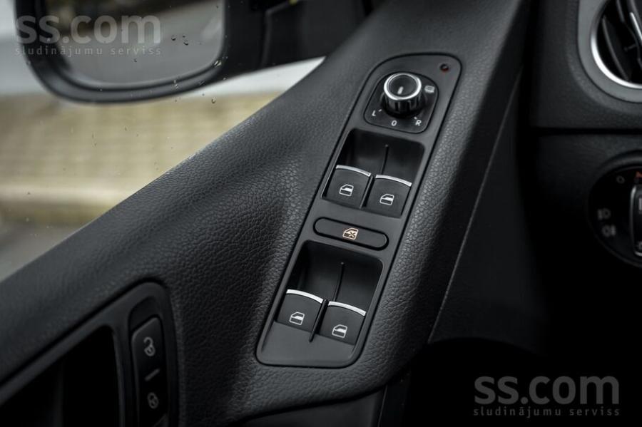 Black Volkswagen Tiguan 2011 in Riga, with an engine capacity of 2.00 L and mileage of 216 thousand km for 7490 €, photo 27 on AUTOMOTO.COM.LV