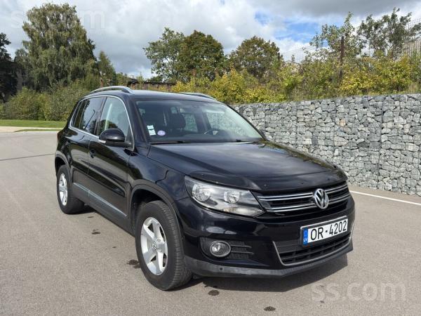 Black Volkswagen Tiguan 2011 in Rezekne, with an engine capacity of 1.40 L and mileage of 206 thousand km for 7700 €, photo 4 on AUTOMOTO.COM.LV