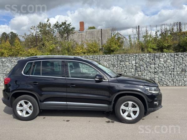 Black Volkswagen Tiguan 2011 in Rezekne, with an engine capacity of 1.40 L and mileage of 206 thousand km for 7700 €, photo 5 on AUTOMOTO.COM.LV