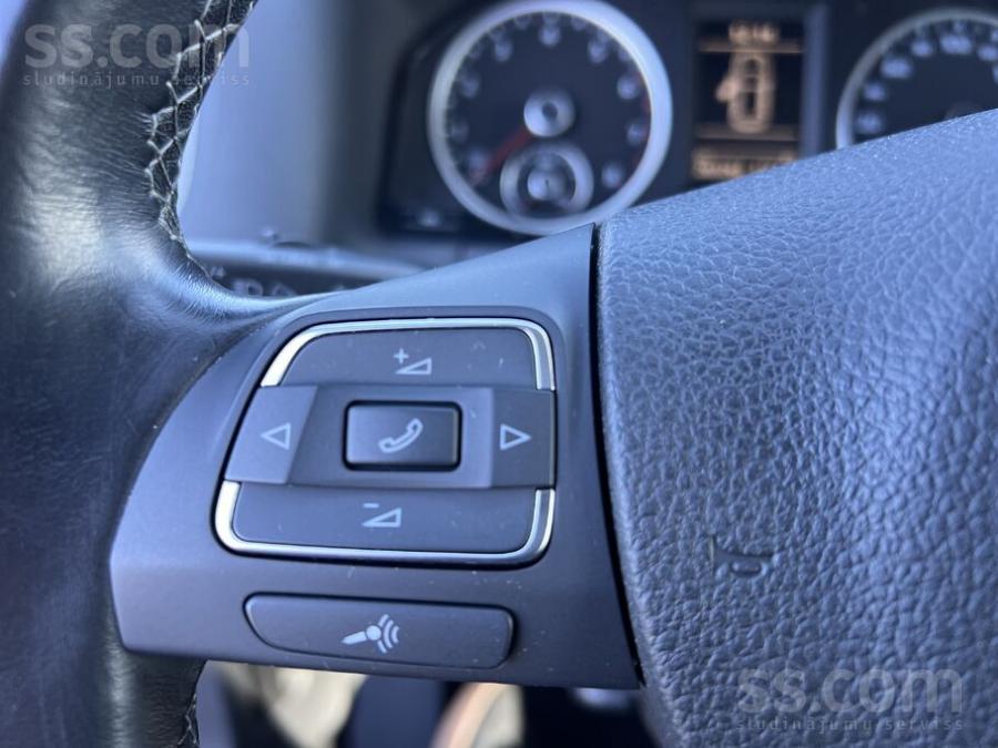 Black Volkswagen Tiguan 2011 in Cesis, with an engine capacity of 2.00 L and mileage of 203 thousand km for 7950 €, photo 17 on AUTOMOTO.COM.LV