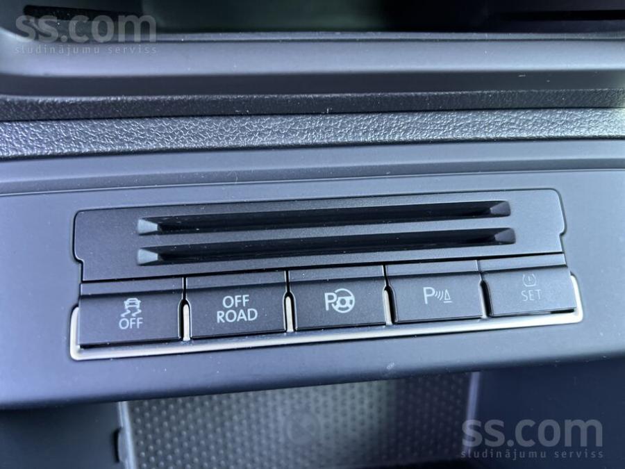 Black Volkswagen Tiguan 2011 in Cesis, with an engine capacity of 2.00 L and mileage of 203 thousand km for 7950 €, photo 23 on AUTOMOTO.COM.LV