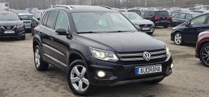 Black Volkswagen Tiguan 2012 in Kaunas, with an engine capacity of 2.00 L and mileage of 310 thousand km for 10950 €, photo  on AUTOMOTO.COM.LV