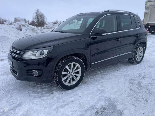Melns Volkswagen Tiguan 2012 Panevēža, ar dzinēja tilpumu 1.98 L un nobraukumu 337 tūkst. km par 8300 €, foto 1 vietnē AUTOMOTO.COM.LV